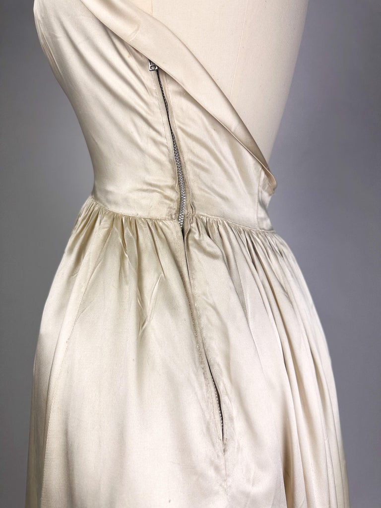 Evening dress by Lucien Lelong Couture in embroidered champagne satin ...