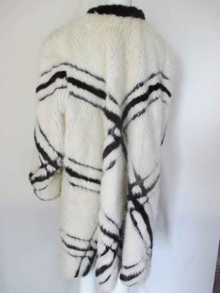 Exceptional Black and White Flared Mink Fur Coat For Sale at 1stDibs