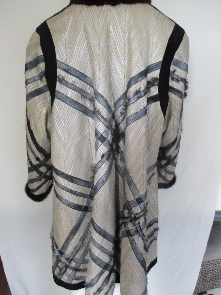 Exceptional Black and White Flared Mink Fur Coat For Sale at 1stDibs