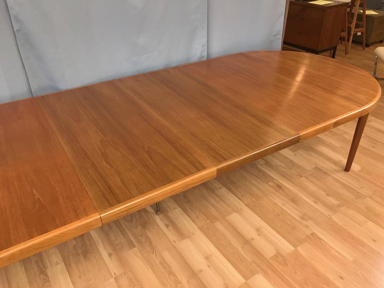 Expansive Danish Modern Extendable Teak Dining Table at 1stDibs