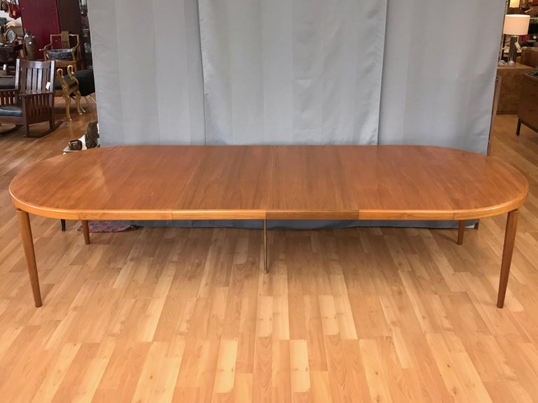 Expansive Danish Modern Extendable Teak Dining Table at 1stDibs