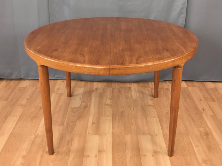 Expansive Danish Modern Extendable Teak Dining Table at 1stDibs