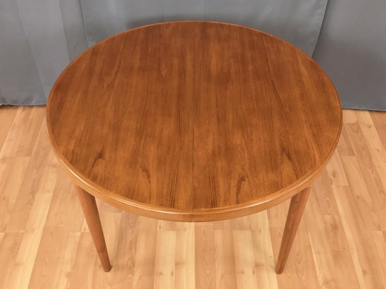 Expansive Danish Modern Extendable Teak Dining Table at 1stDibs