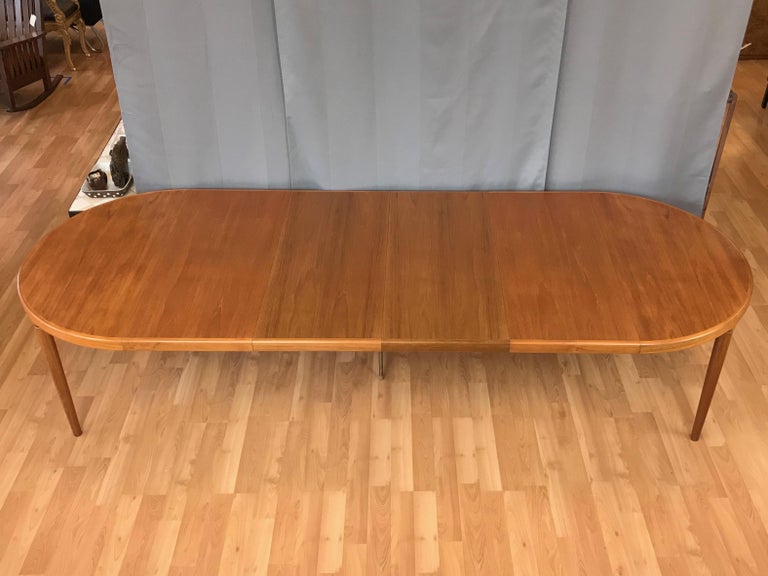 Expansive Danish Modern Extendable Teak Dining Table at 1stDibs
