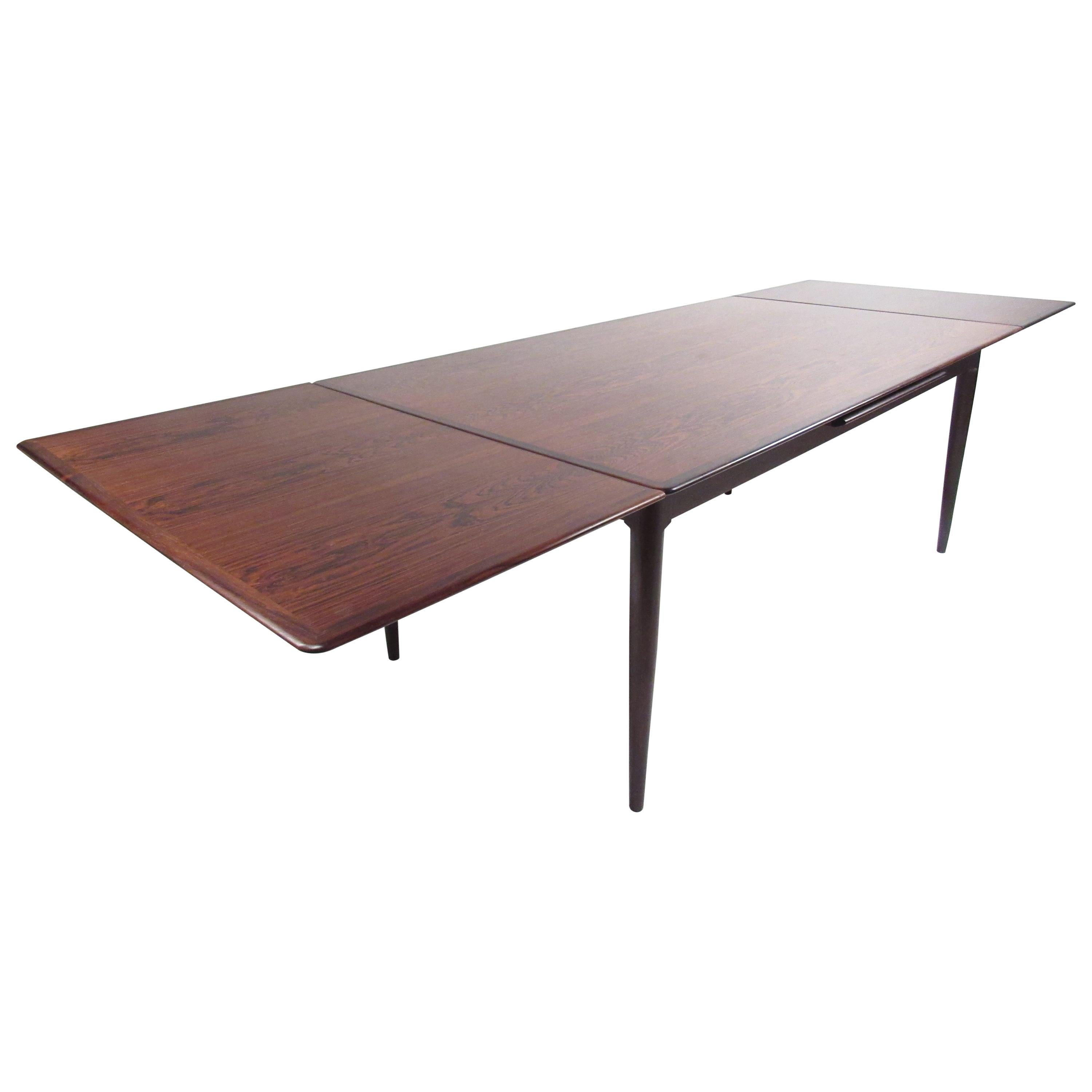 Exquisite Midcentury Danish Rosewood Draw Leaf Dining Table at 1stDibs