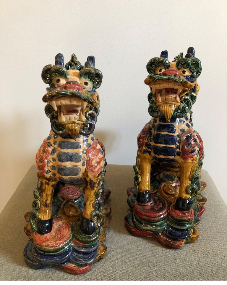 Exquisite Pair of Glazed Porcelain Foo Dogs For Sale at 1stDibs