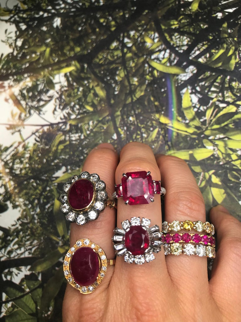 5.51 Carats Ruby Cabochon Ring with a Diamond Halo For Sale at 1stDibs