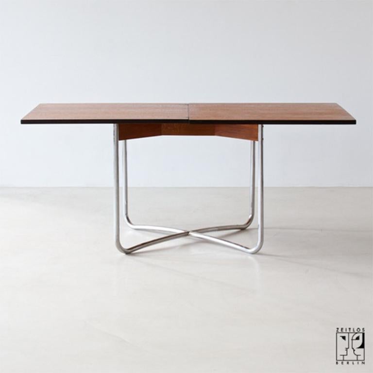 Extendable Bauhaus dining table made of tubular steel and veneered ...