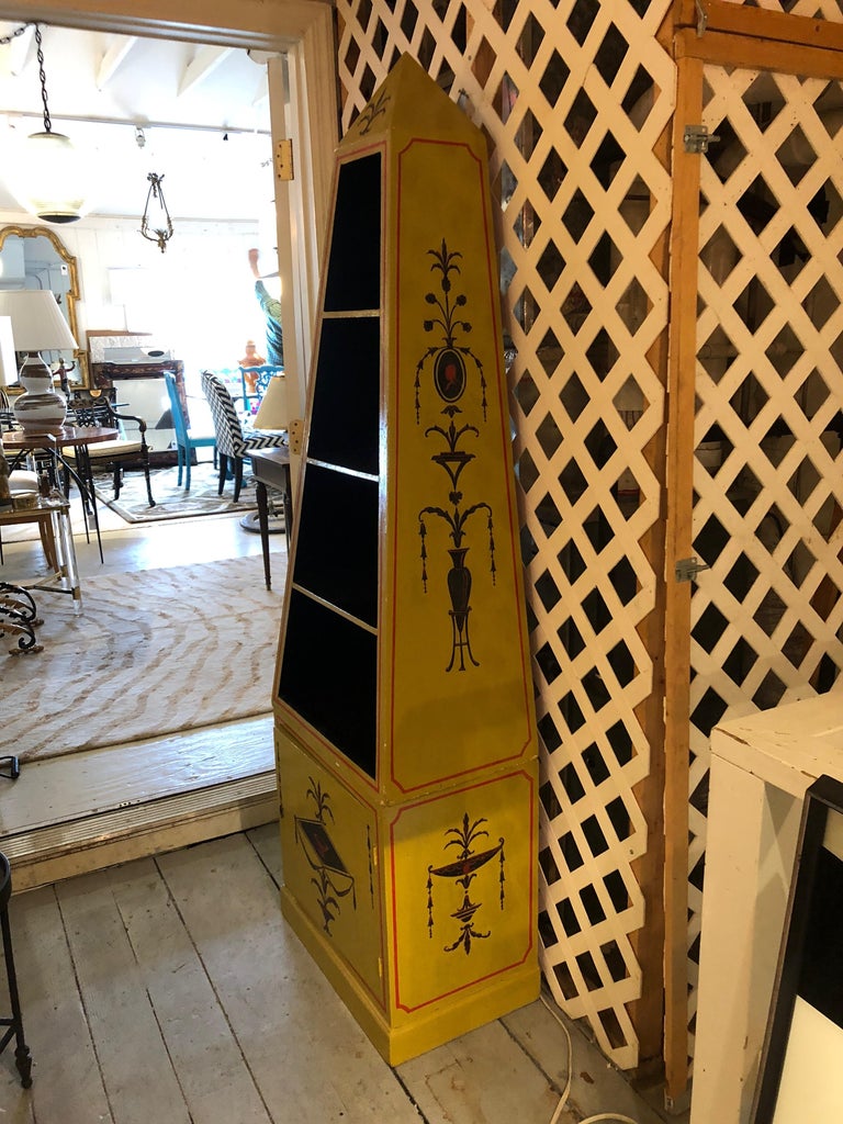 Eye-Catching Hand Painted Obelisk Shaped Book Shelf and Cabinet at 1stDibs