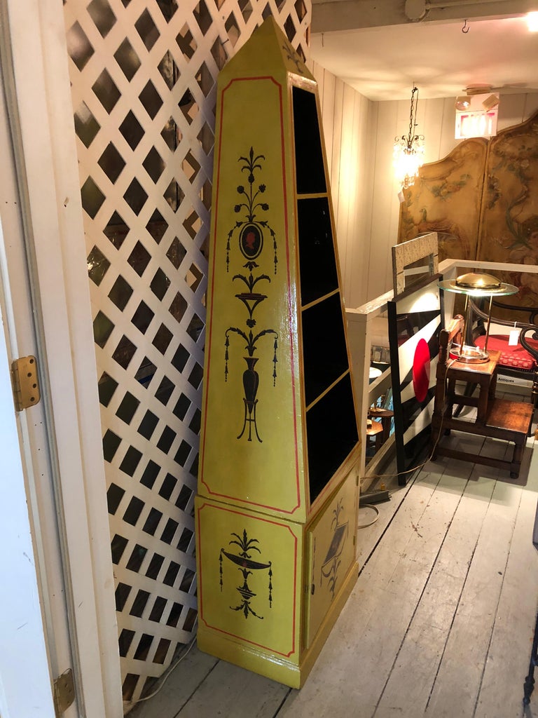 Eye-Catching Hand Painted Obelisk Shaped Book Shelf and Cabinet at 1stDibs