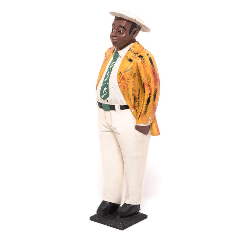 African Colonial Figure with Yellow Jacket at 1stDibs