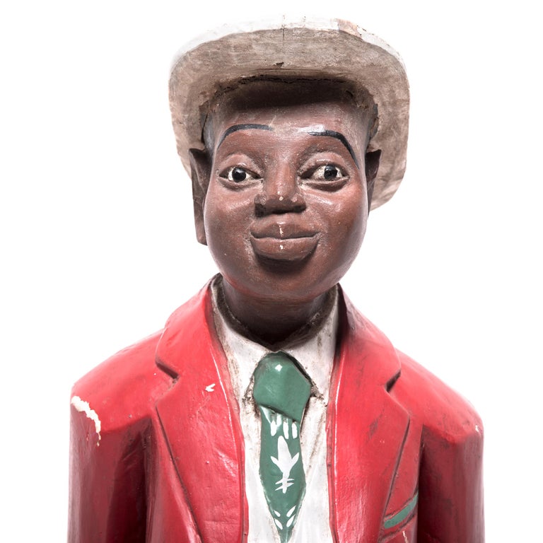 African Colonial Figure with Red Jacket at 1stDibs