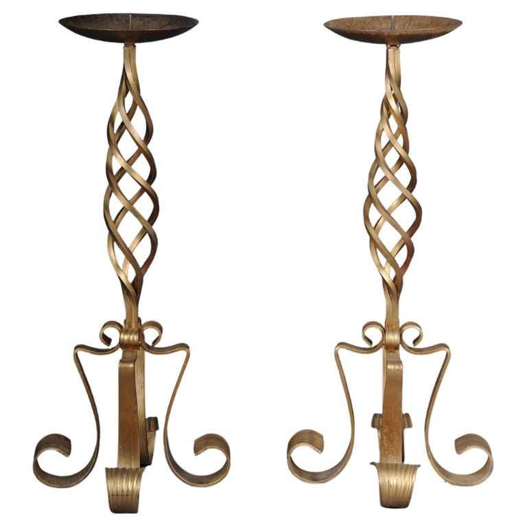 Fancy torchères/candlesticks in gilded cast iron For Sale at 1stDibs