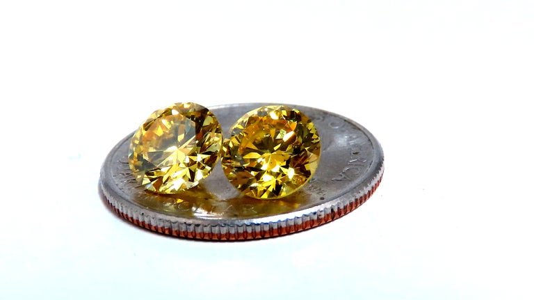 Fancy Vivid Yellow Round Diamonds 4.06ct Gia Certified For Sale at 1stDibs