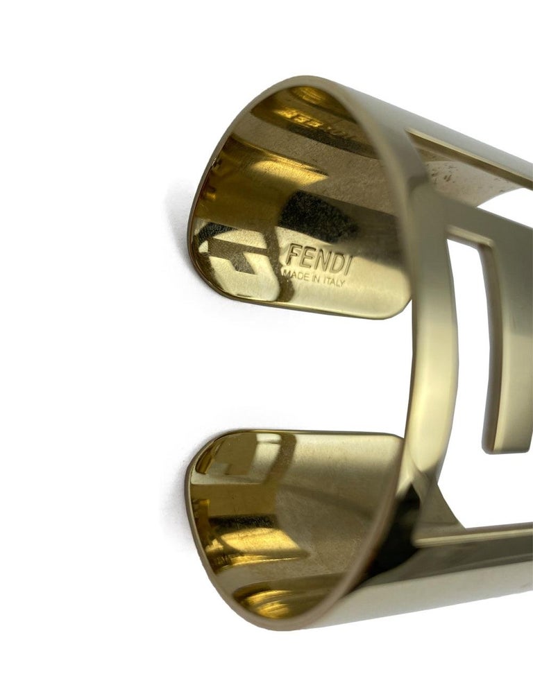 Fendi Gold Cuff Bracelet with Fendi Logo Cut Out For Sale at 1stDibs