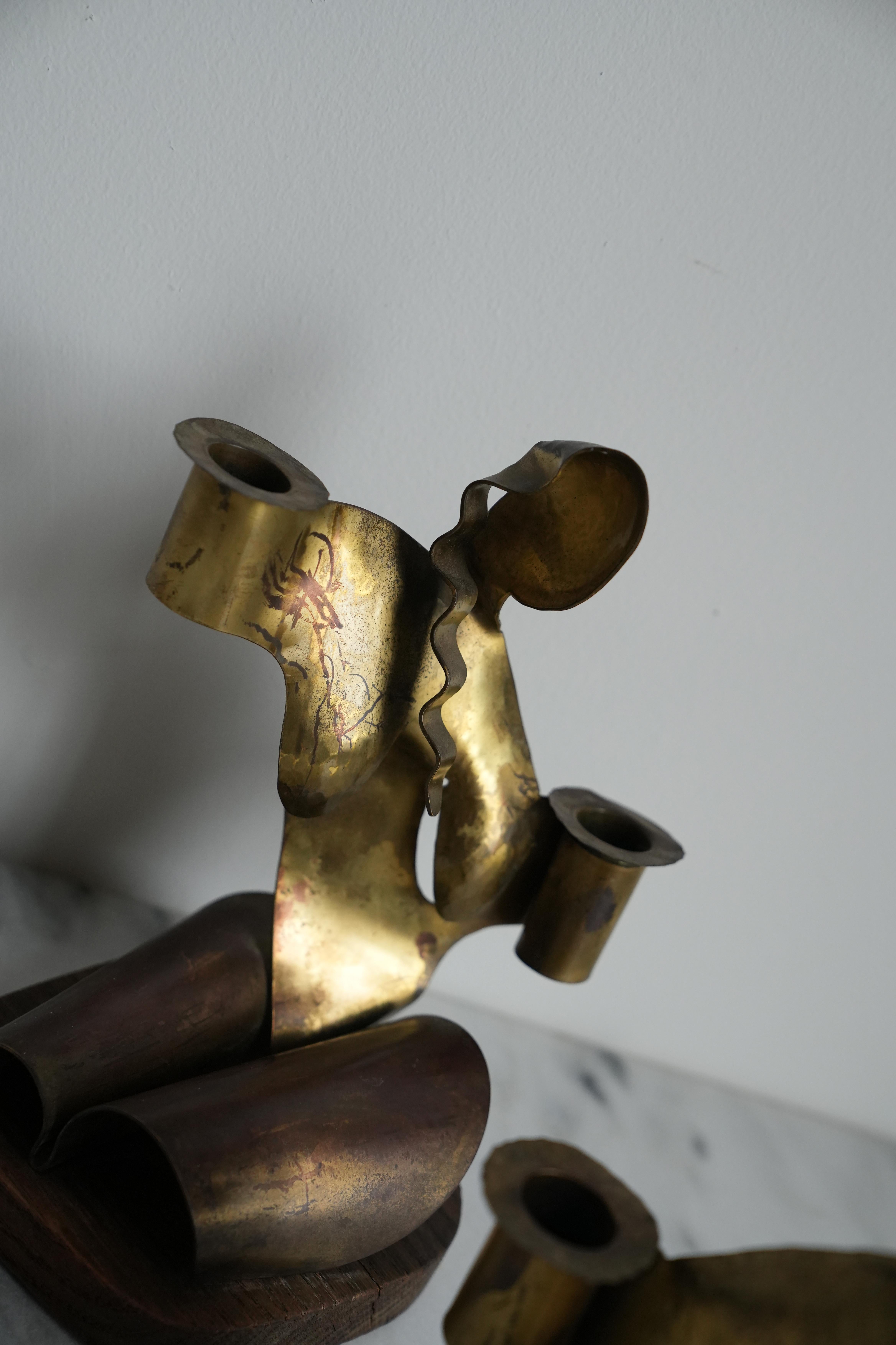 Figural Hammered Brass Candlesticks For Sale at 1stDibs