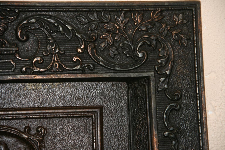Figurative Fire Back with Matching Surround For Sale at 1stDibs