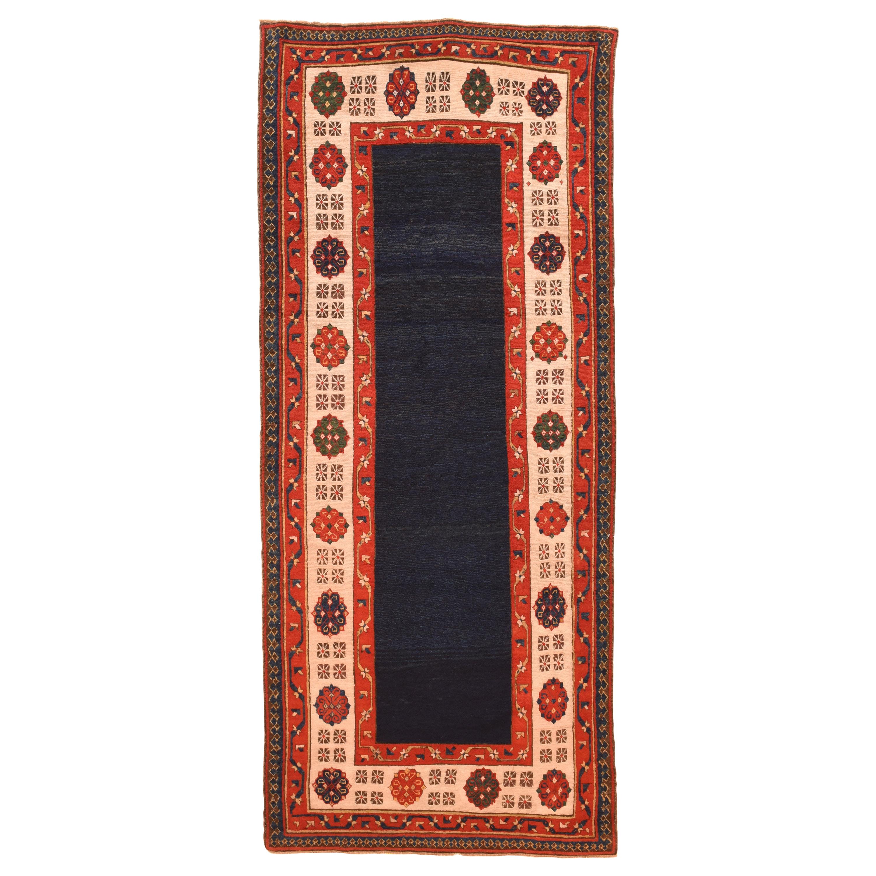 Antique Russian Pinwheel Kazak Rug at 1stDibs