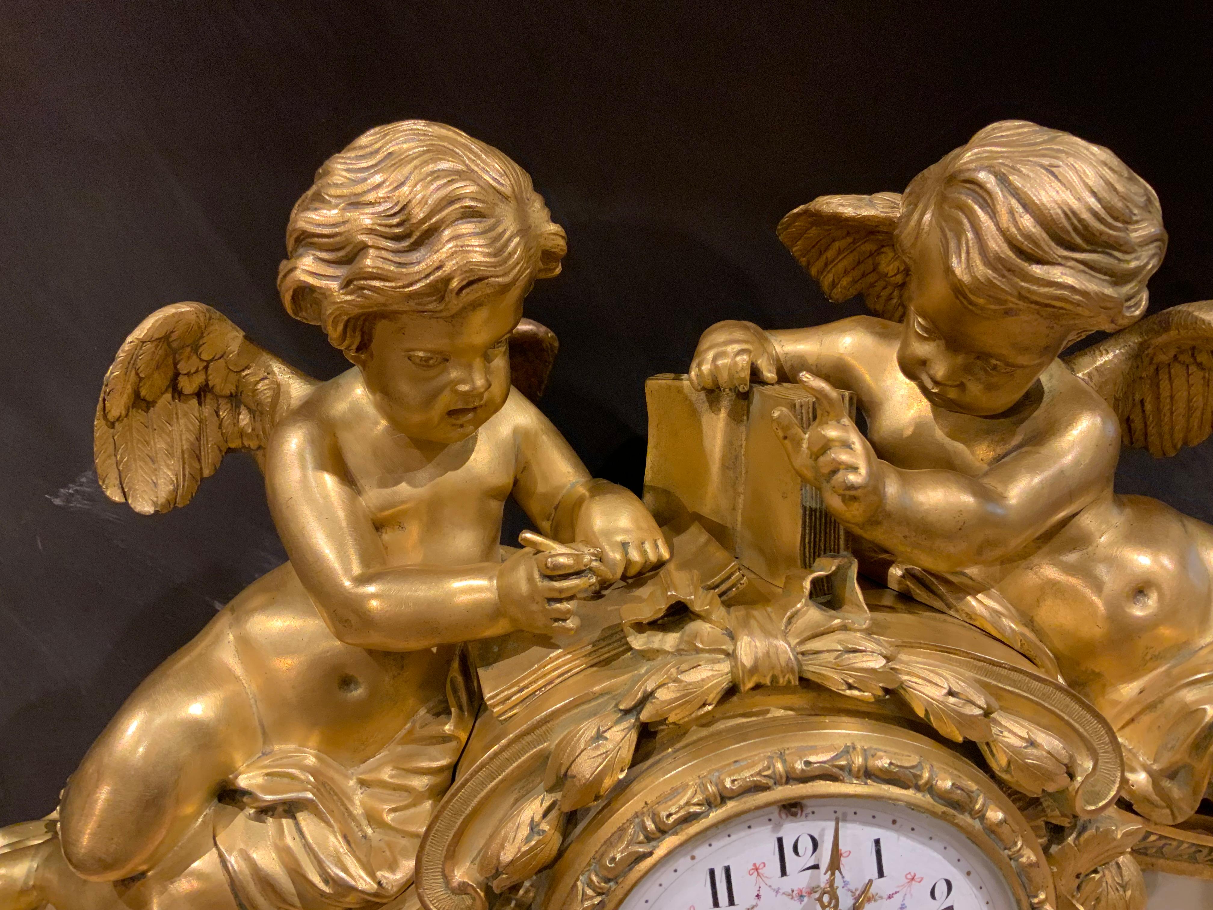 Fine French bronze dore clock with angels at 1stDibs