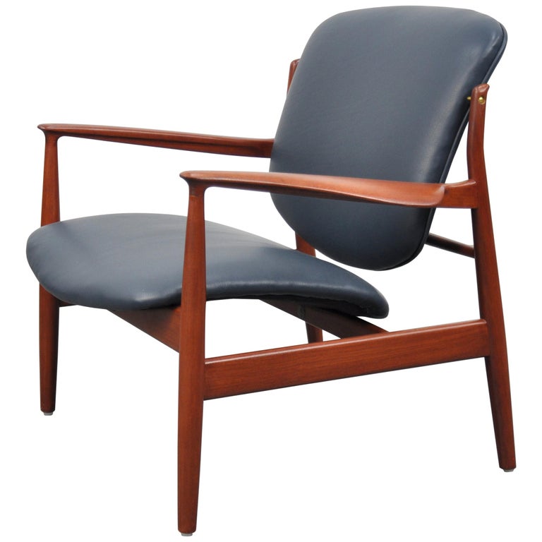 Finn Juhl FD 136 Teak and Navy Blue Leather Lounge Chair at 1stDibs