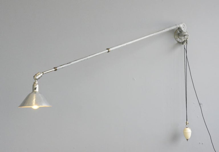 First Edition Triplex Telescopic Counter Weight Wall Lamp at 1stDibs