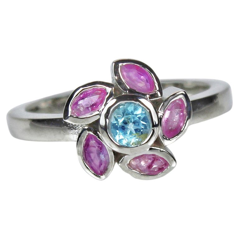 Floral Ring with Natural Pink Rubies and Blue Topaz For Sale at 1stDibs
