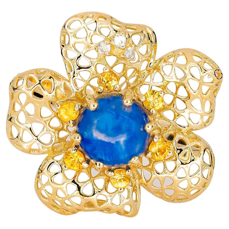 "Flower" Ring with Central Sapphire Cabochon, Yellow Sapphires, and ...