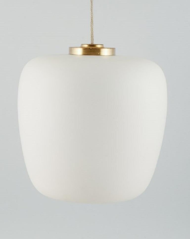 Fog and Mørup pendant in frosted opal glass with brass mounting. Mid ...