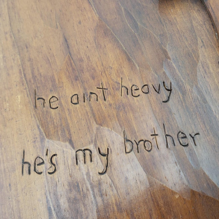 Folk Art Carved Panel of Two Brothers Titled: "He Ain't Heavy, He's My ...