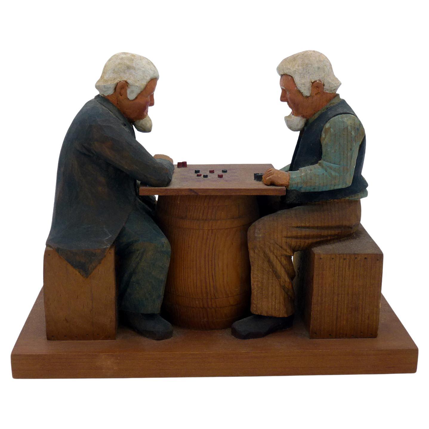 Folk Art Carving of 2 Men Playing Checkers on Top of a Barrel by Jack ...