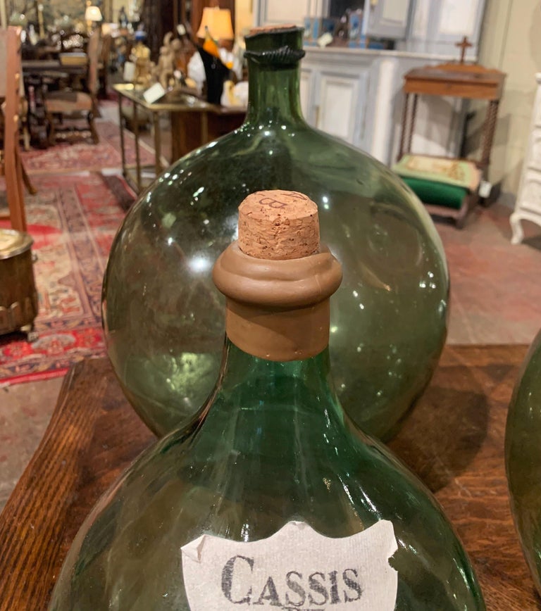 Four 19th Century French Hand Blown Glass Wine Bottles with Decorative ...