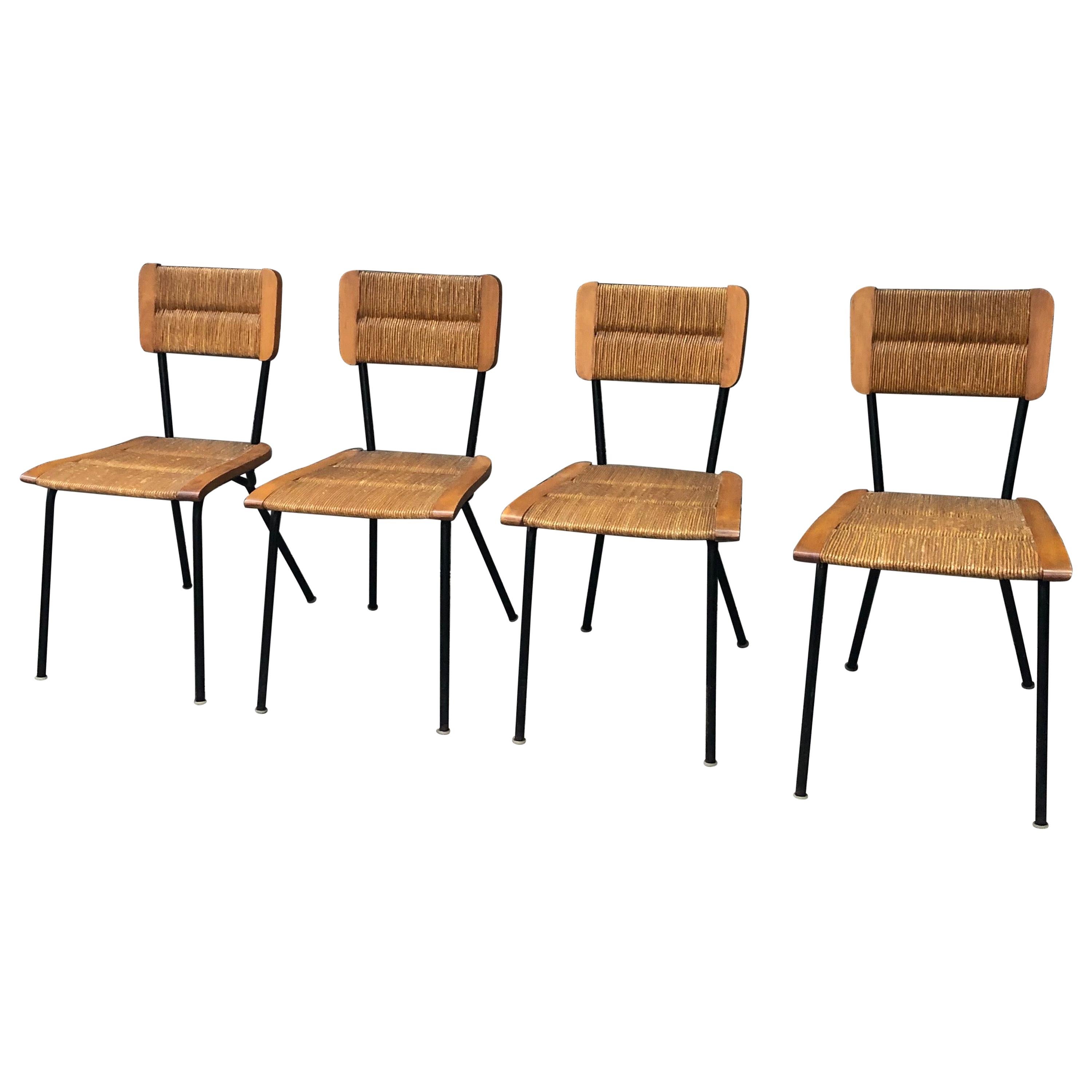 Modernist Rattan Chairs on Metal Frame at 1stDibs