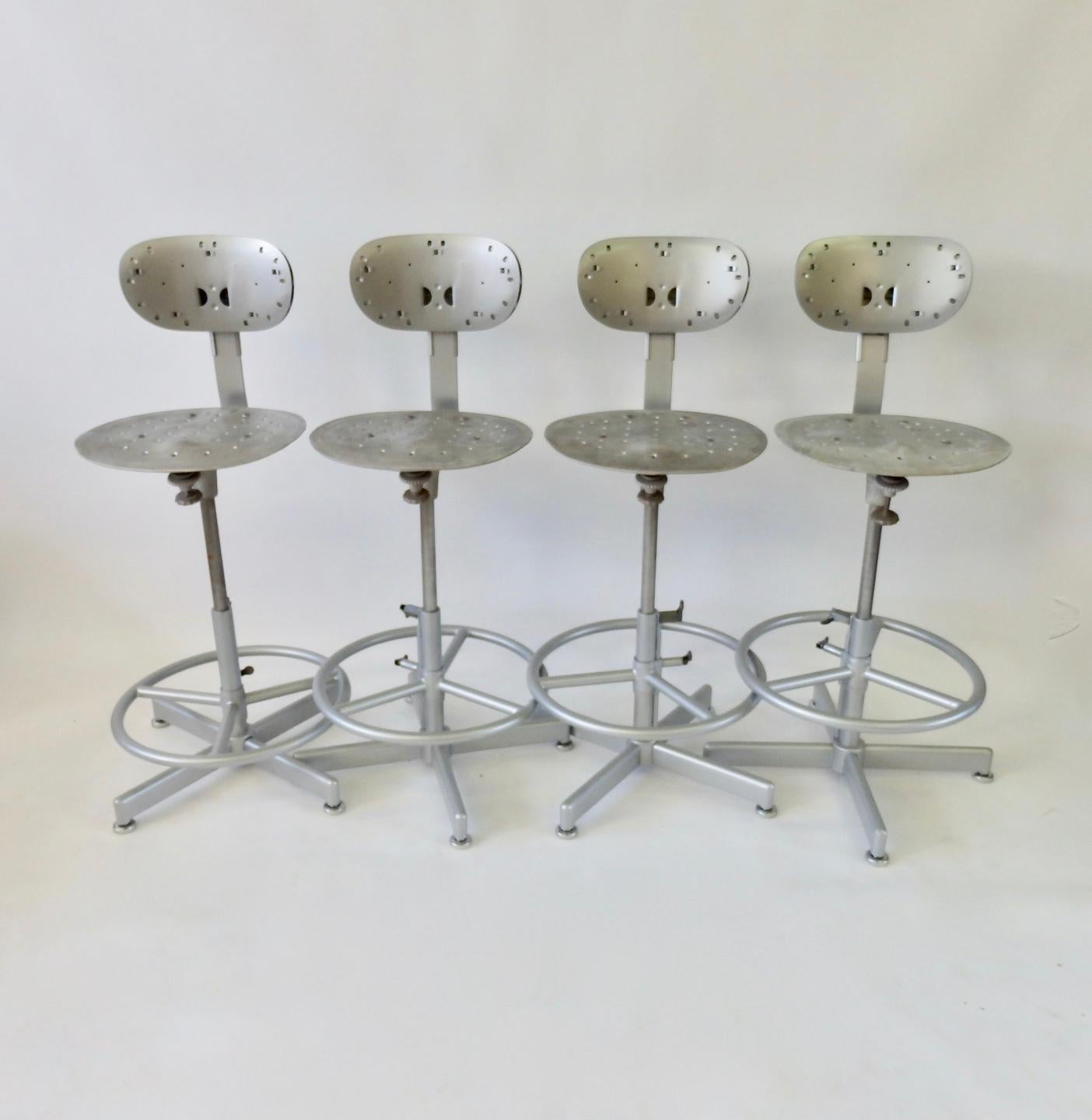 Four Multi Adjustable Industrial Operators Swivel Bar or Counter Stools ...