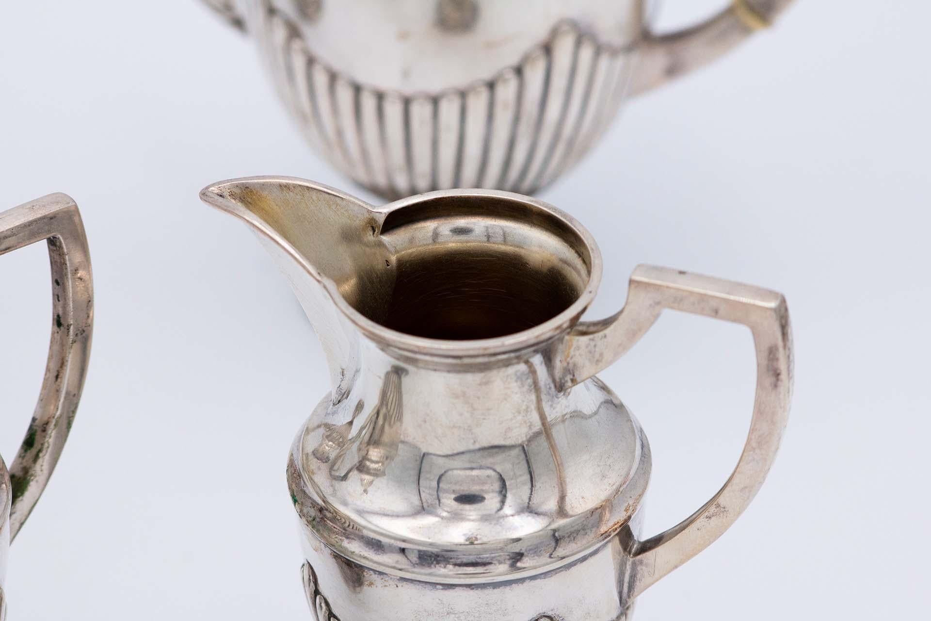 Four-piece silver tea service For Sale at 1stDibs