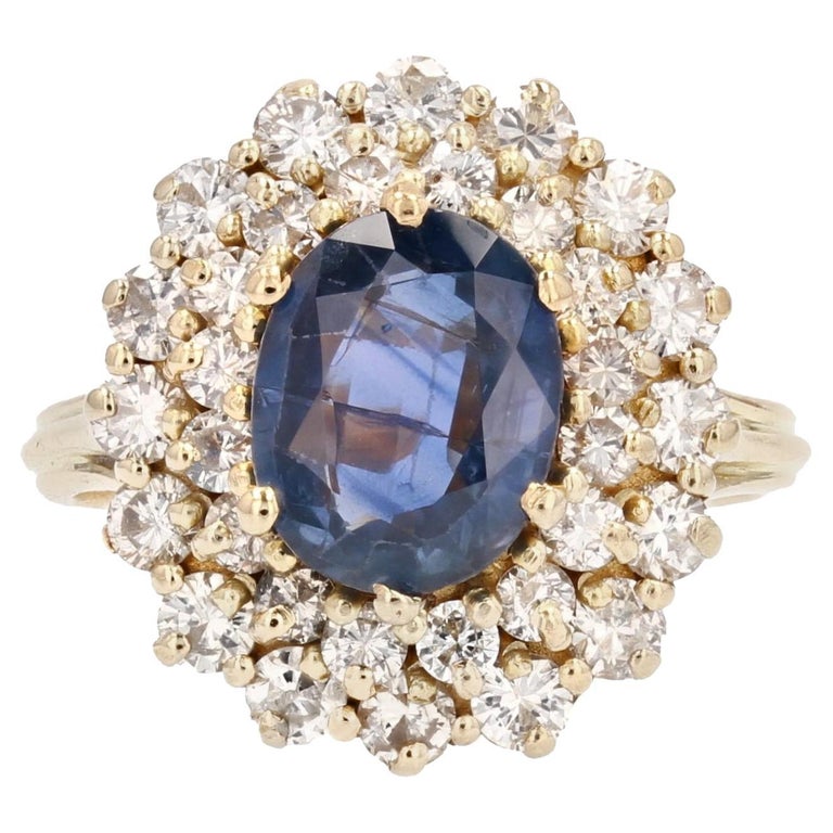 18 Karat Gelbgold-Ring mit 2 Karat Saphiren und zwei Reihen Diamanten ...