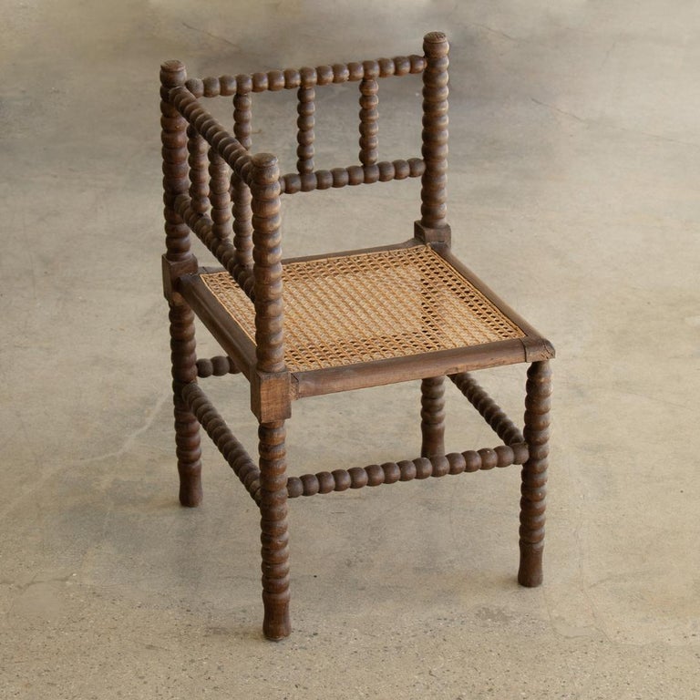 French Bobbin Wood and Cane Corner Chair at 1stDibs