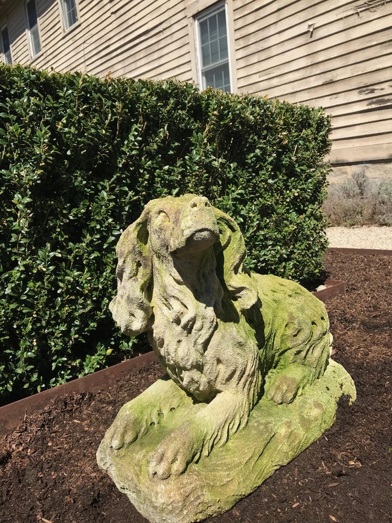 French Carved Limestone Curly-Coated Spaniel Dog Statue at 1stDibs