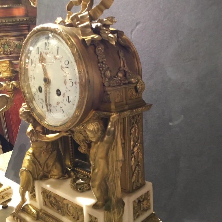 French Clock Garniture Set in White Marble and Bronze Dore at 1stDibs