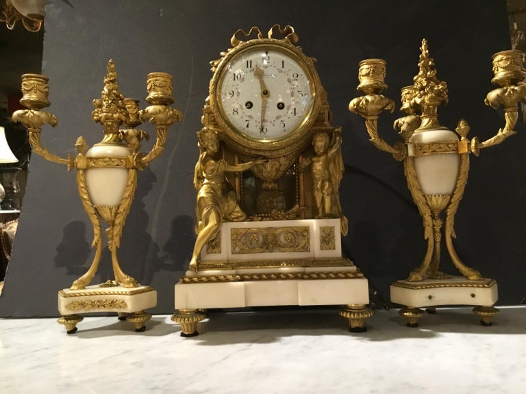 French Clock Garniture Set in White Marble and Bronze Dore at 1stDibs