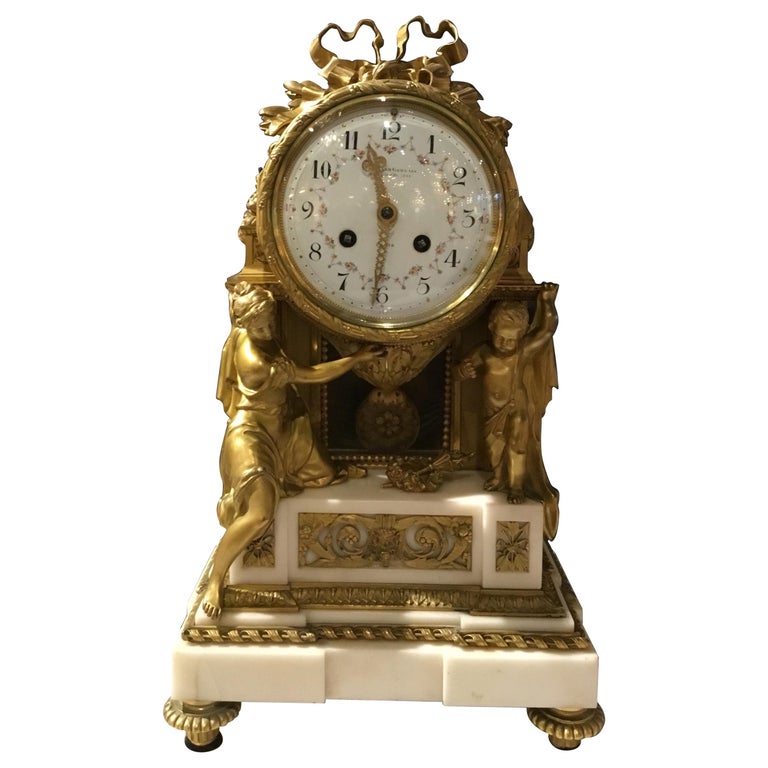 French Clock Garniture Set in White Marble and Bronze Dore at 1stDibs