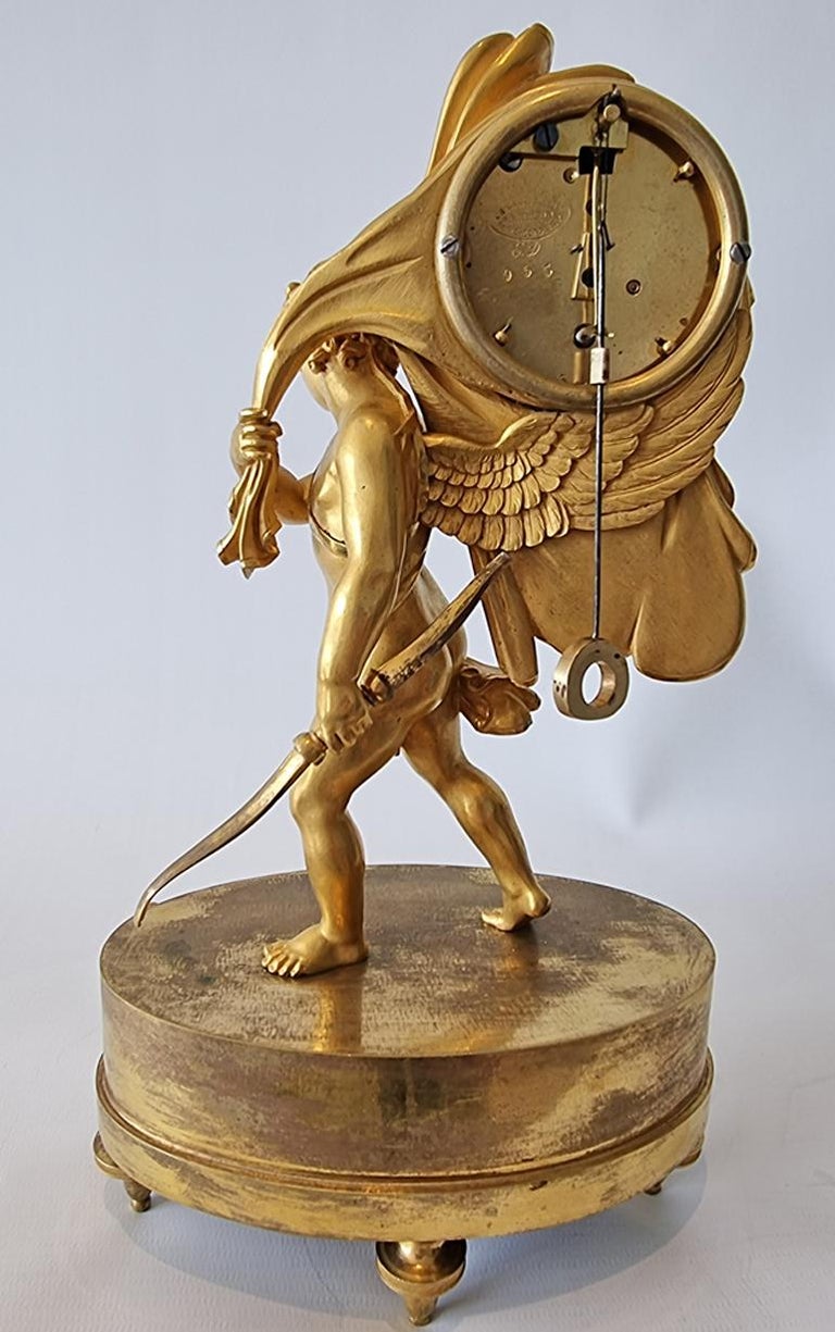 French Empire Miniature Mantel Clock of Cupid Carrying Time at 1stDibs