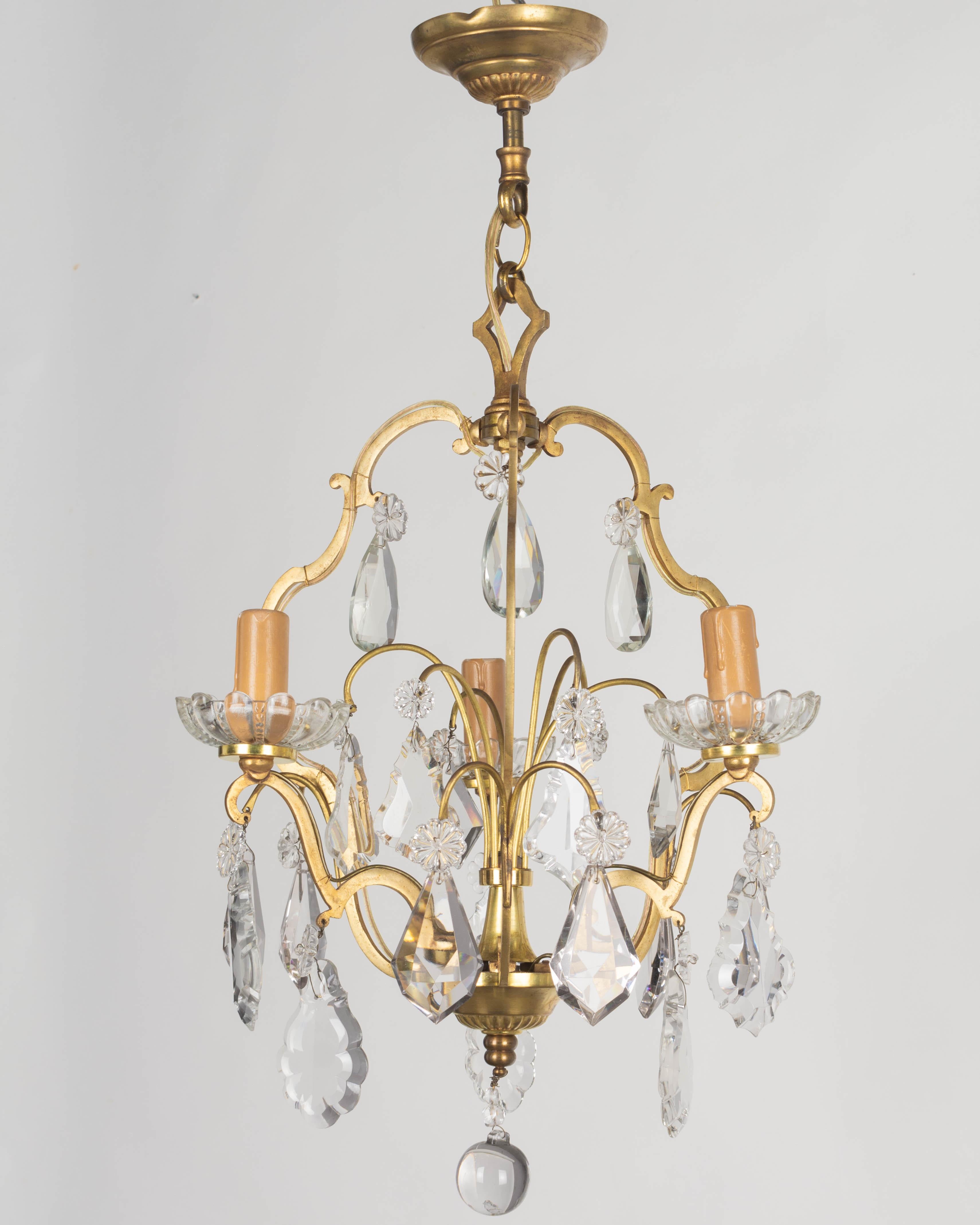 French Louis XV Style Brass and Crystal Chandelier For Sale at 1stDibs