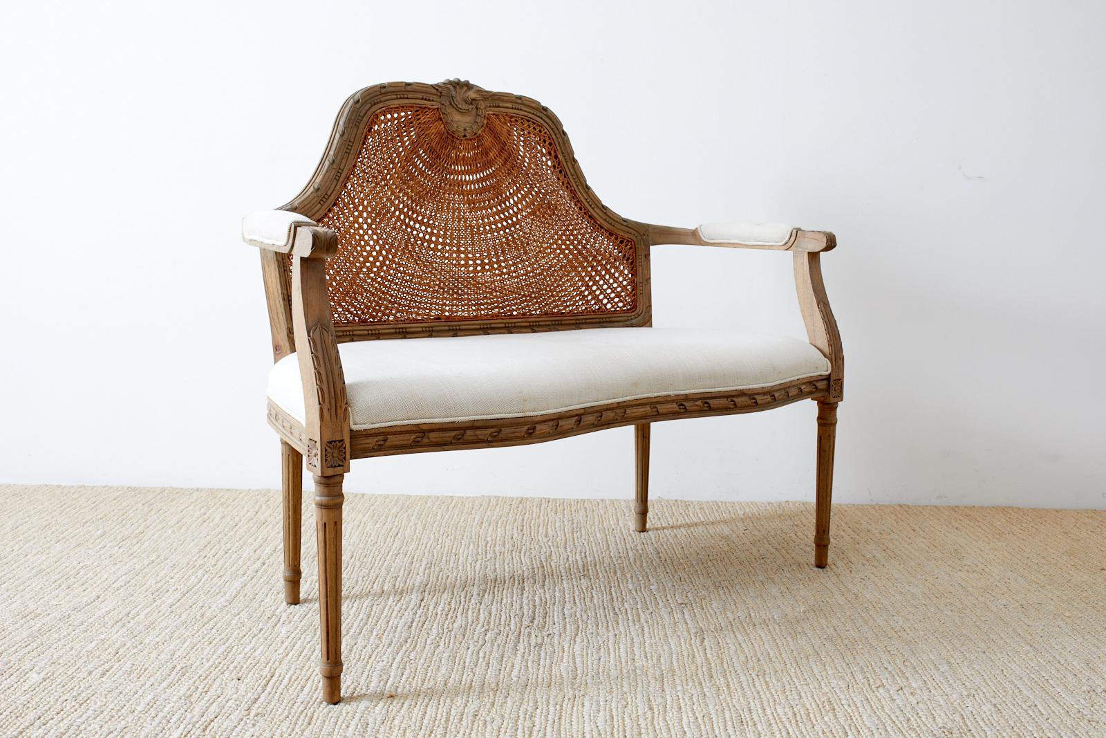 French Louis XVI Style Caned Back Linen Settee at 1stDibs