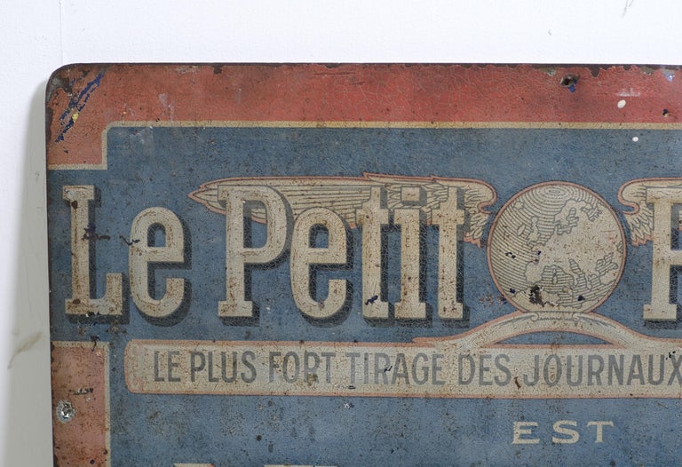 French Newspaper Le Petite Parisien Wood Tin Wall Sign For Sale at 1stDibs