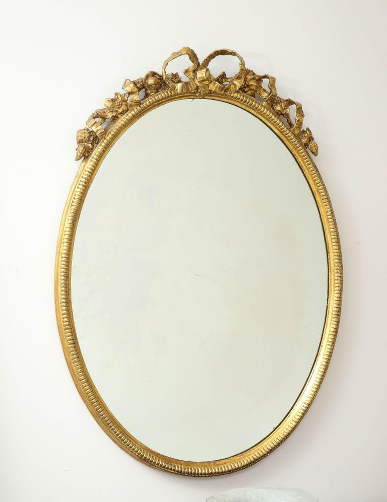 French Oval Gilt Mirror with Bow Crest, 1860 For Sale at 1stDibs