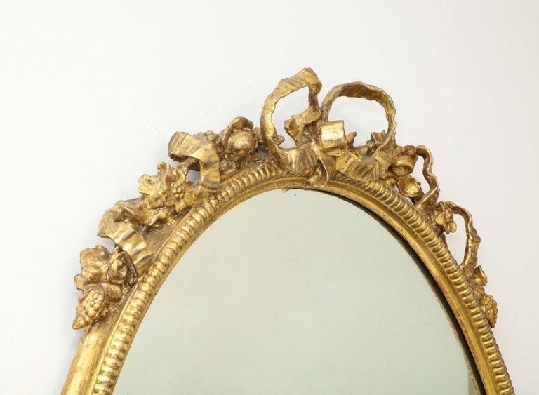 French Oval Gilt Mirror with Bow Crest, 1860 For Sale at 1stDibs