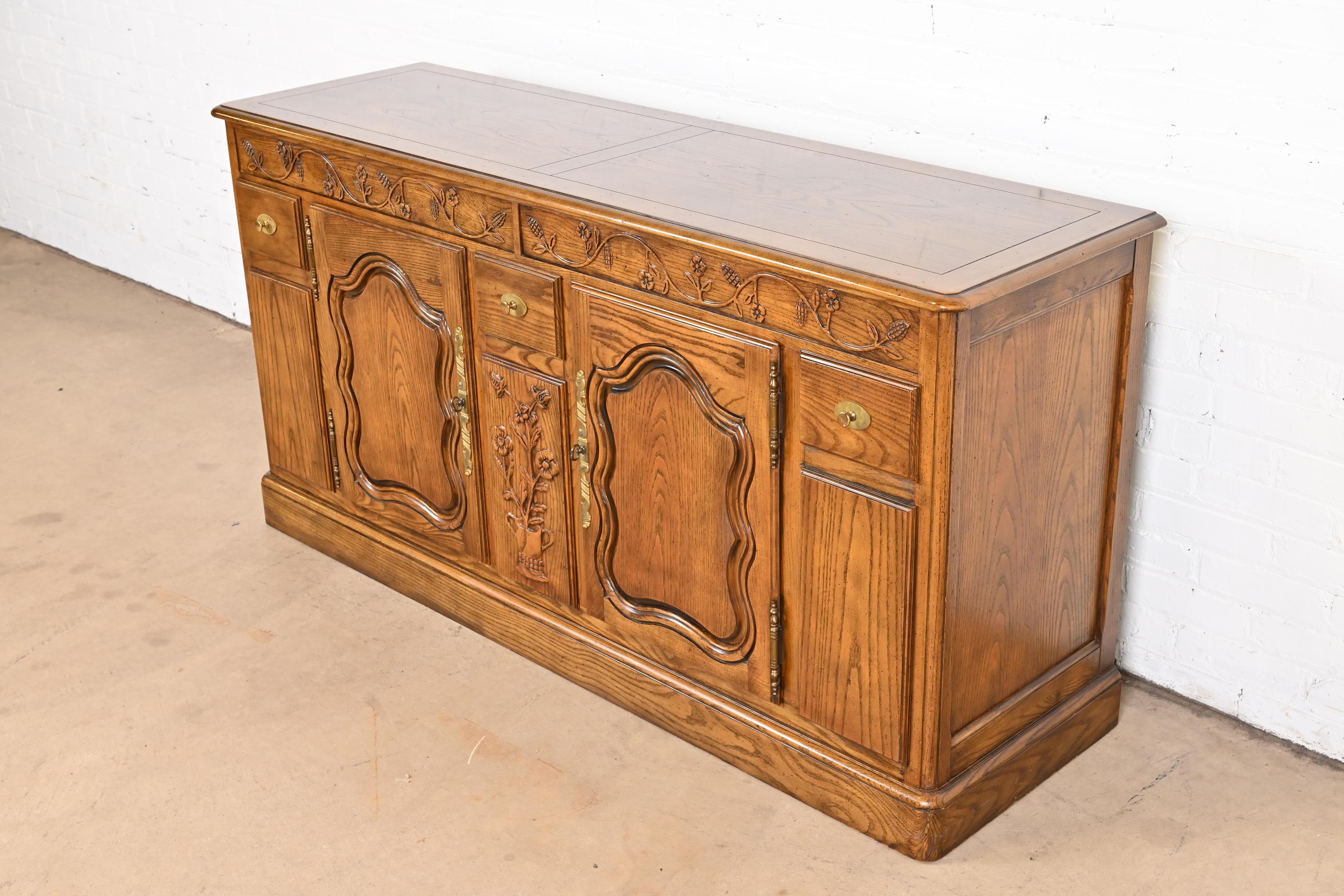 French Provincial Louis XV Carved Oak Sideboard in the Manner of Baker ...