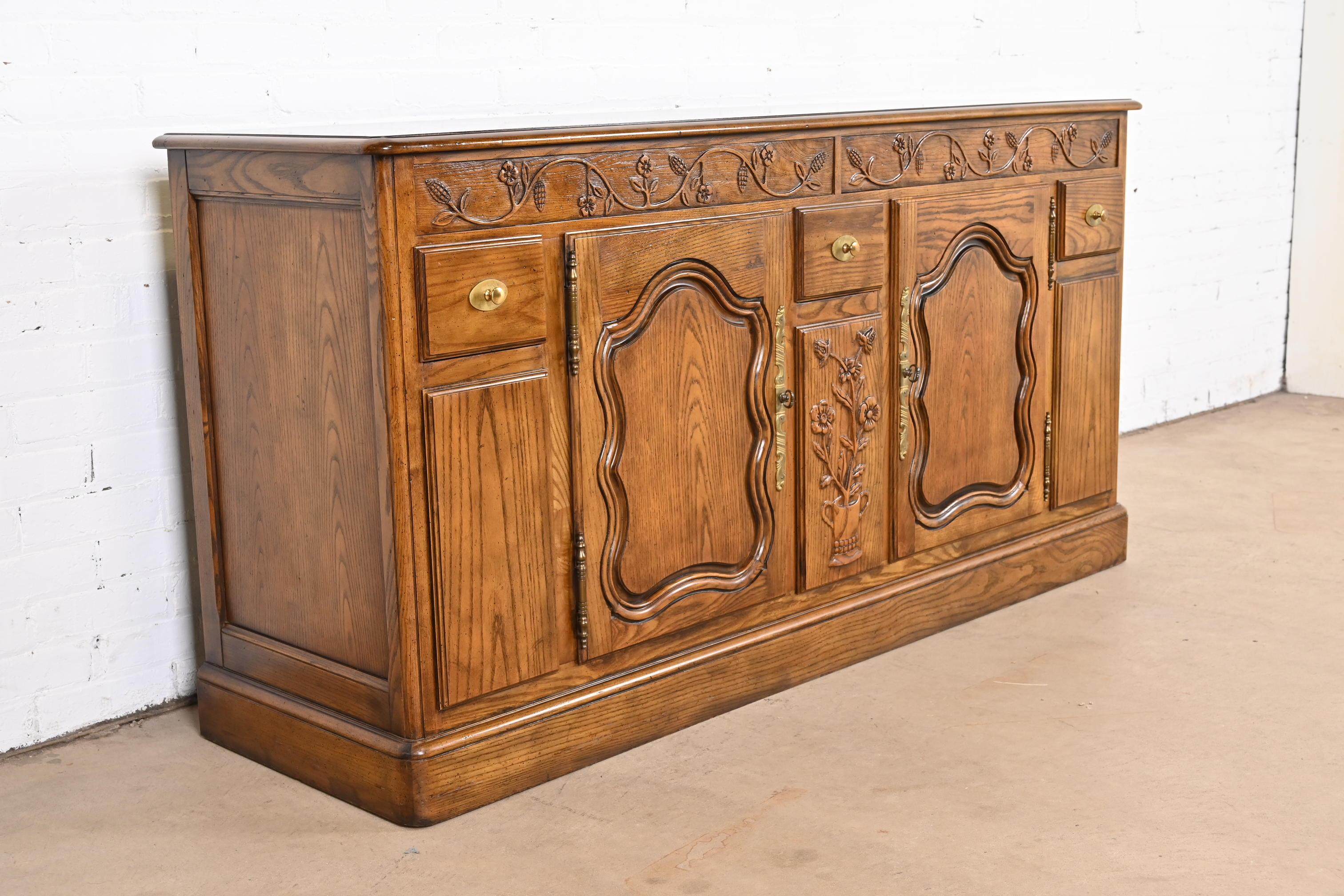 French Provincial Louis XV Carved Oak Sideboard in the Manner of Baker ...