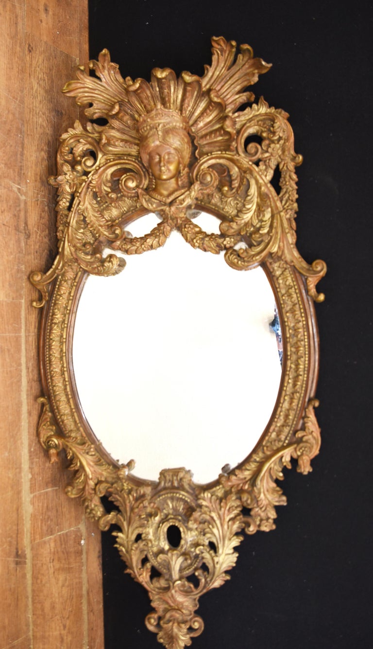 French Rococo Mirror Oval Maidens Head Gilt Frame For Sale at 1stDibs