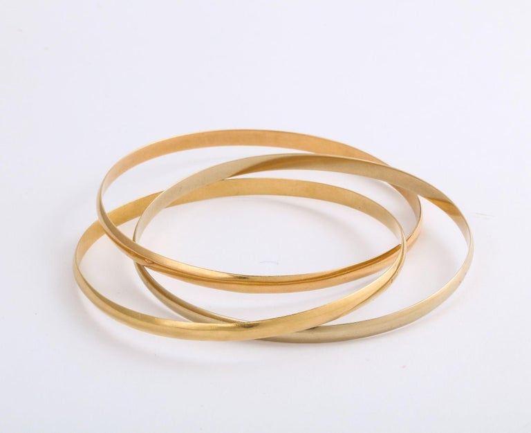 French Rolling Bangles in Tricolor Gold For Sale at 1stDibs